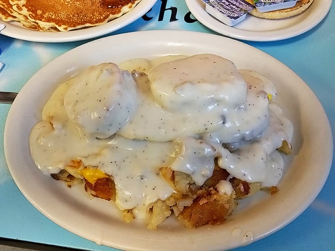 Gravy so thick it could practically stand up and introduce itself, smothering biscuits in a warm, peppery embrace.