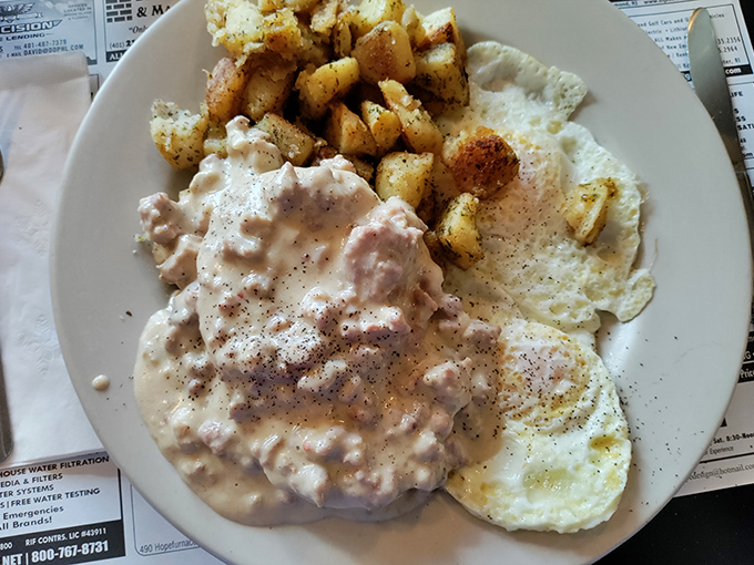 Biscuits and gravy that would make your Southern grandmother nod in approval. Creamy, peppery gravy that doesn't skimp on the good stuff.
