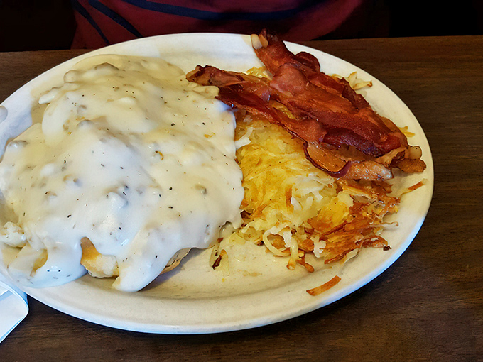 Biscuits and gravy: where pepper-flecked cream sauce blankets everything in a warm hug that says, "Go ahead, cancel your lunch plans."
