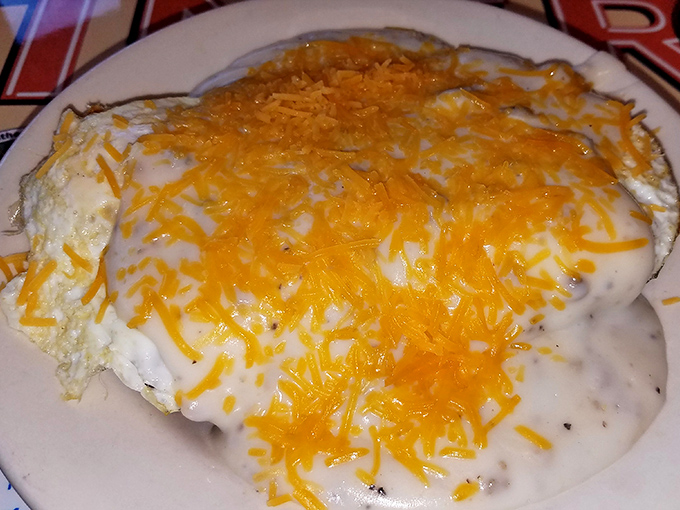 Biscuits and gravy that would make your grandmother both proud and jealous. That melted cheese is performing a slow, beautiful dance across the top.