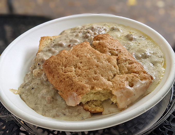 Biscuits and gravy: the Southern comfort food that makes Northerners question why they live where winter exists. This version looks like a warm, creamy hug on a plate.