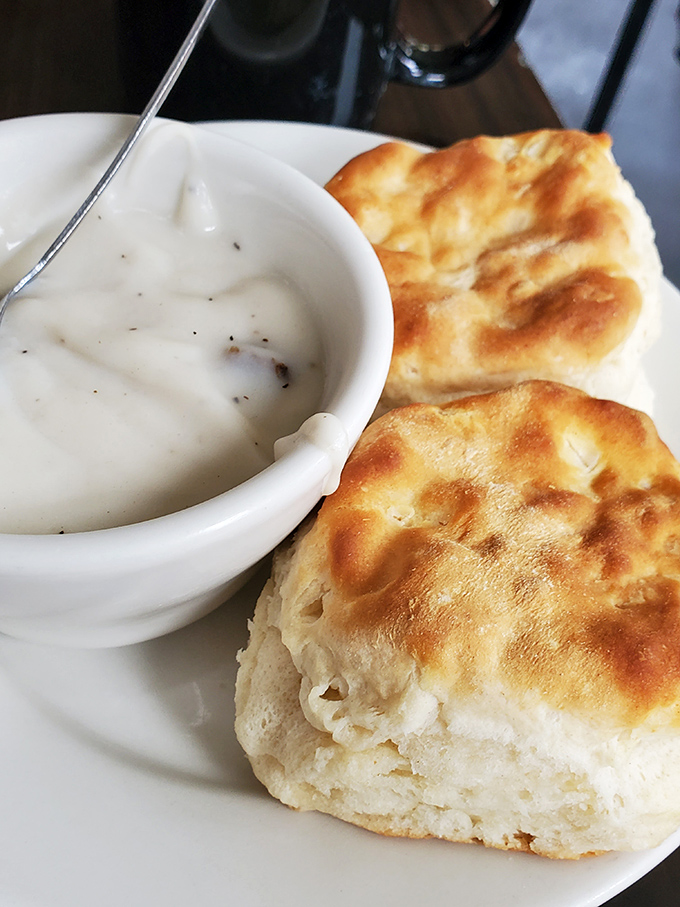 These biscuits aren't just made from scratch&mdash;they're made with conviction. The gravy looks like it's been simmering since yesterday, in the best possible way.