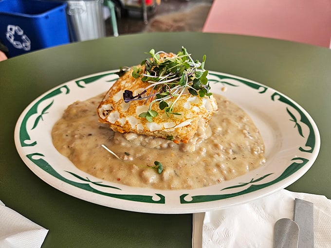 Biscuits swimming in creamy mushroom gravy, topped with a perfectly fried egg. Southern comfort meets Midwest hospitality on a plate.