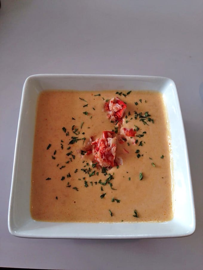 Lobster bisque that's practically a religious experience: velvety, rich, and adorned with chunks of lobster like rubies in a royal crown.