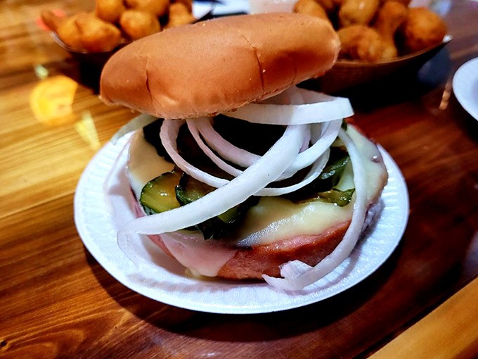 The legendary bologna sandwich in all its glory &ndash; thick-cut meat, melty cheese, crisp pickles, and onions on a soft bun. Bologna's redemption story.