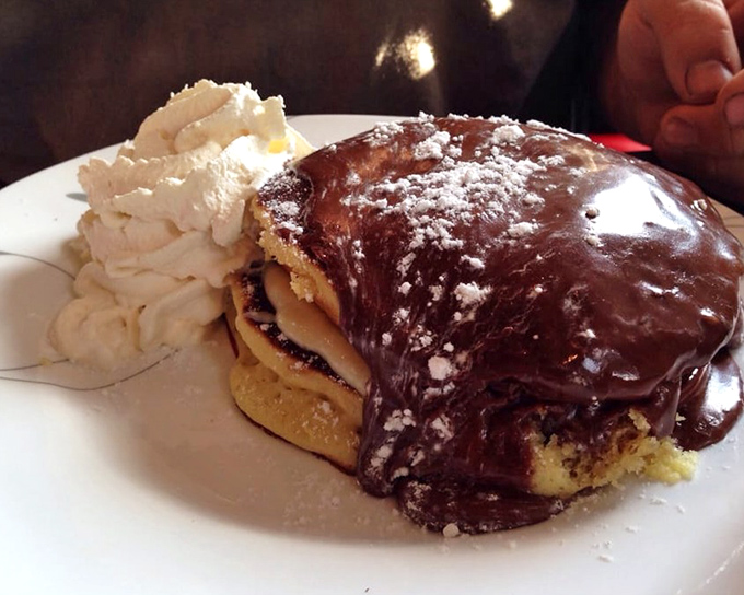 Chocolate-drenched decadence that blurs the line between breakfast and dessert. Boston cream pie had a beautiful baby with pancakes, and we're all invited to the christening.
