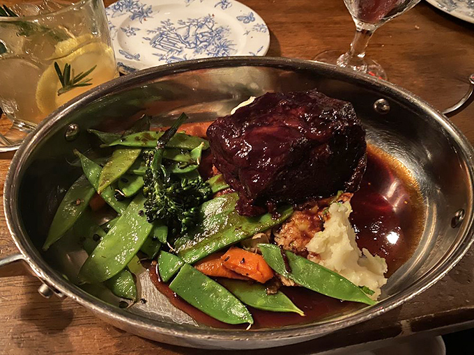 Braised beef so tender it surrenders to your fork without resistance, accompanied by vegetables that actually taste like themselves&mdash;a culinary miracle.