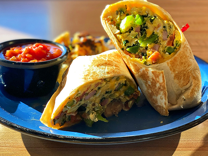 Breakfast burritos: where morning ingredients find themselves wrapped in a warm tortilla hug alongside a side of salsa for dipping.