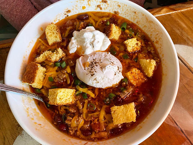 Breakfast chili topped with poached eggs and cornbread croutons&mdash;because sometimes morning hunger requires serious artillery, not just a muffin and coffee.