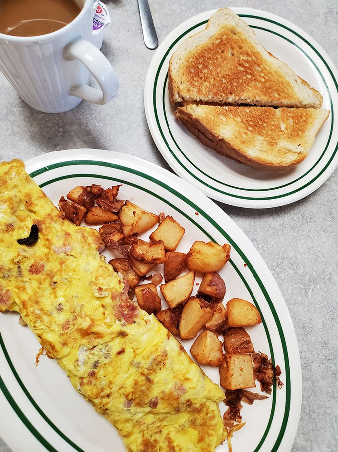 Breakfast perfection doesn't exi&mdash; Oh wait, here it is: a fluffy omelet alongside home fries that crackle with each bite and toast that's achieved golden nirvana.