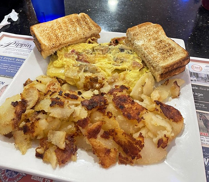 Breakfast perfection isn't complicated: golden hash browns with crispy edges, eggs your way, and toast that's actually toasted properly. Revolutionary concept.
