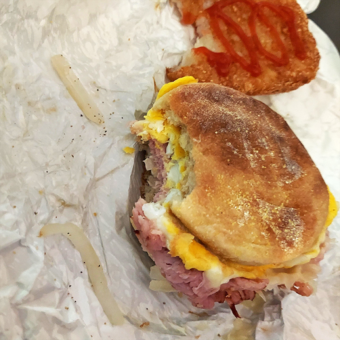 Beyond the buns, their breakfast sandwiches deserve attention too. This ham and egg creation proves Mr. Sticky's savory game is strong.