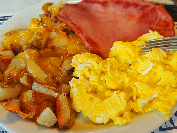 Breakfast of champions, or anyone who appreciates that eggs, ham, and potatoes are the holy trinity of morning sustenance.