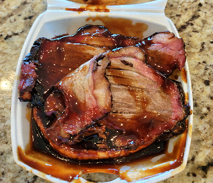 Brisket so perfectly smoked it brings a tear to your eye. That bark, that pink smoke ring&mdash;it's barbecue architecture at its finest.