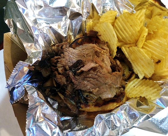 Brisket so tender it practically surrenders to your fork. Served with no pretense, just honest-to-goodness smoky perfection.