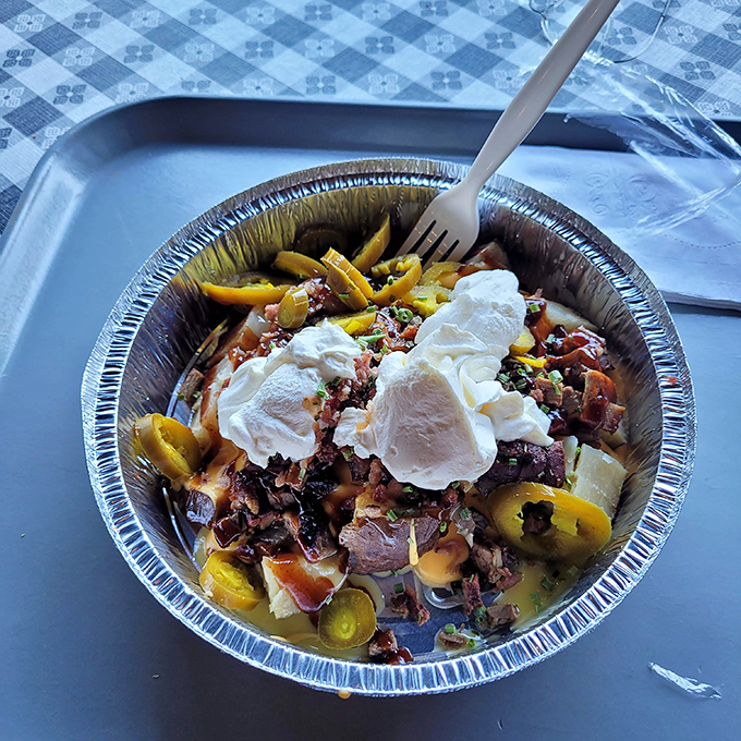 Loaded nachos that require both hands and possibly a bib. Worth every messy, delicious bite and napkin.