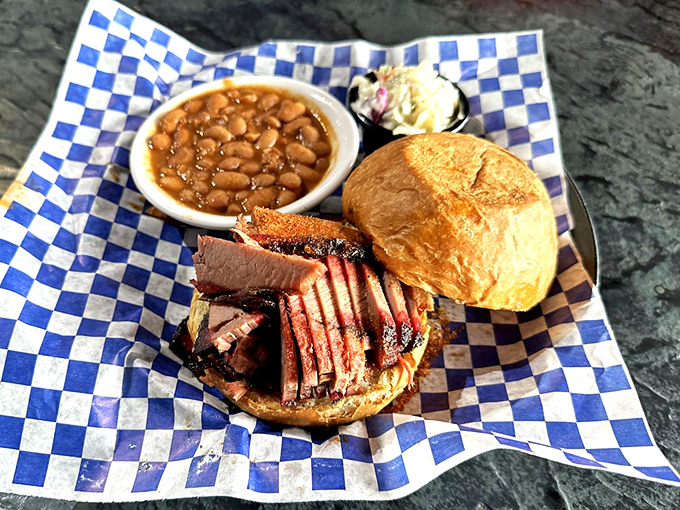 A brisket sandwich that doesn't need fancy garnishes&mdash;just meat, bread, and the confidence to let quality speak for itself. The beans aren't sidekicks; they're co-stars.