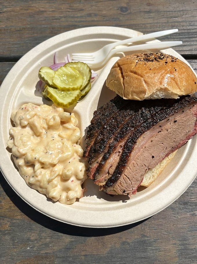 The brisket sandwich&mdash;where smoked meat meets carbs in a relationship more perfect than any Hollywood romance. Mac and cheese plays supporting actor.
