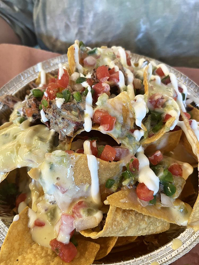 These nachos aren't messing around&mdash;loaded with brisket, queso, pico de gallo, and enough joy to make Monday feel like Saturday.