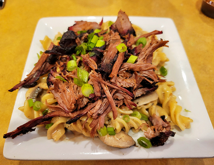 Brisket stroganoff reimagined – tender smoked meat mingles with creamy pasta and green onions in a dish that bridges comfort food and barbecue brilliance.
