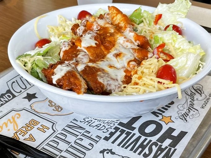 Who said salads can't be exciting? This Buffalo chicken creation proves that "healthy choice" and "flavor explosion" aren't mutually exclusive concepts.