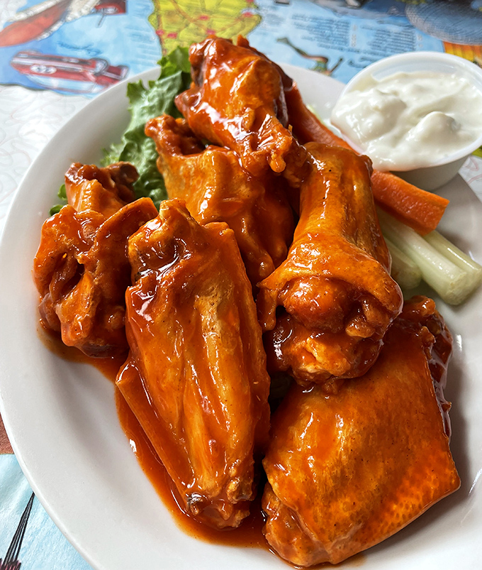 Buffalo wings that would make Buffalonians proud&mdash;crispy, saucy, and served with the obligatory celery sticks and blue cheese dressing for cooling relief.