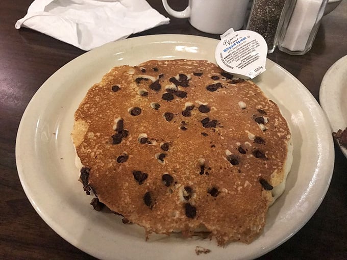 A chocolate chip pancake the size of your steering wheel proves that sometimes bigger really is better for breakfast.