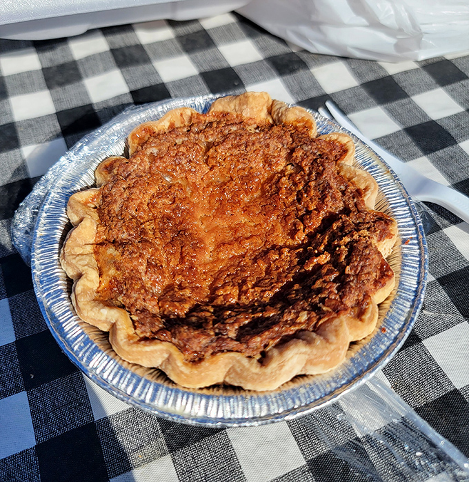 Buttermilk pie that whispers sweet Southern secrets to your taste buds with every creamy bite.