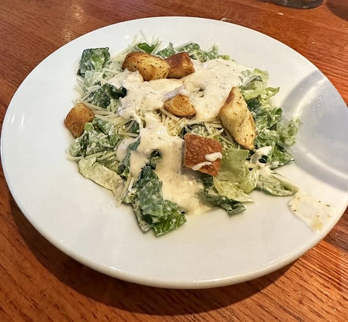 Caesar salad: the unsung hero of bar food. This one's got enough garlic to keep vampires away through the entire playoff season.