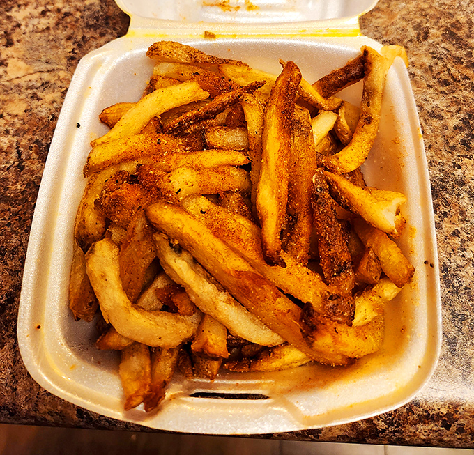 These aren't merely fries; they're crispy, golden vessels for delivering that perfect Cajun kick straight to your happiness receptors.