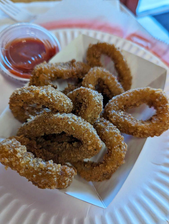 Rings of joy that crunch like a satisfying plot twist. These calamari circles are tender inside with a seasoned coating that demands dipping.
