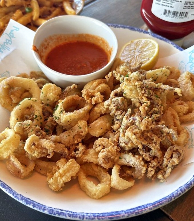 Calamari so tender you'll forget you're eating something with tentacles. The marinara sauce is just showing off at this point.