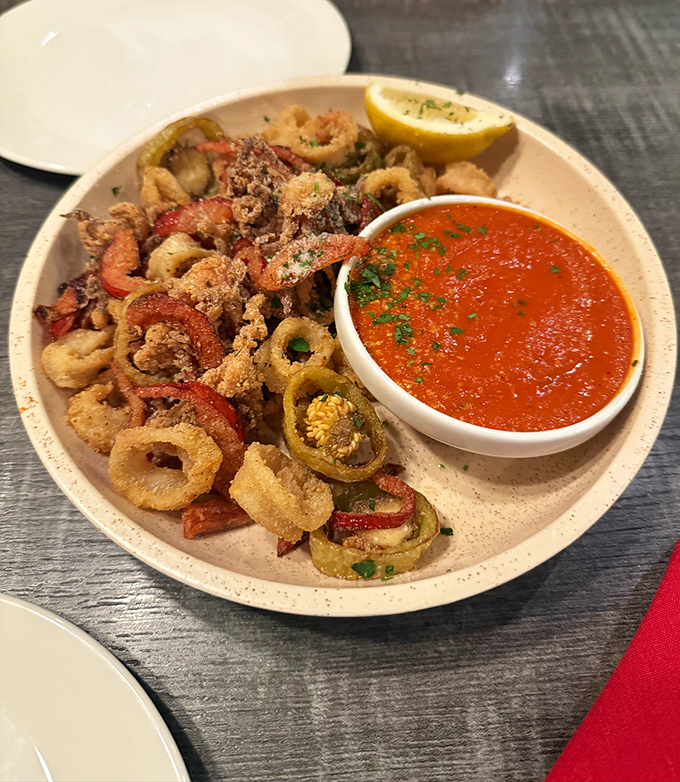 Fried calamari that actually tastes like the sea, not the fryer&mdash;with peppers adding that perfect kick of color and spice.