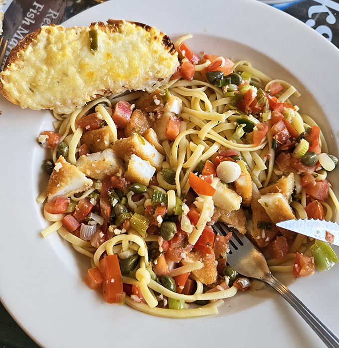 Pasta that doesn't just have seafood in it&mdash;it's been transformed by it. Each twirl of linguine delivers a Mediterranean vacation to your taste buds.