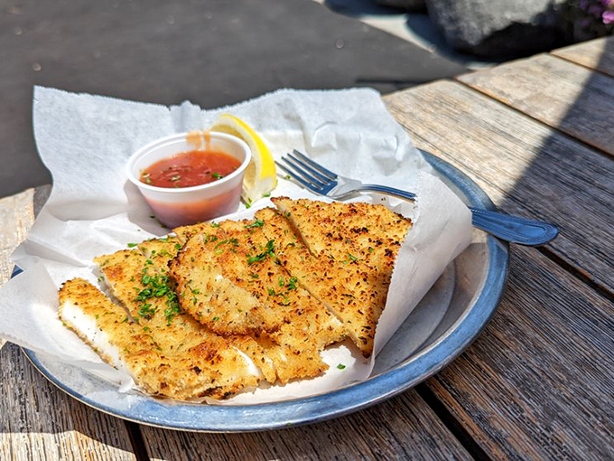 Golden-crisp panko calamari steak that shatters the "rubber band" reputation of squid everywhere&mdash;this is how calamari was meant to be experienced.
