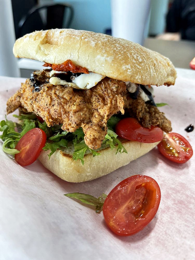 This chicken sandwich brings more freshness than a '90s Will Smith. Crispy chicken, vibrant tomatoes, and greens that actually deserve to be eaten.
