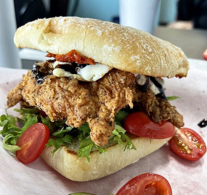 Crispy meets creamy in this chicken masterpiece. Fresh tomatoes and melty cheese transform ordinary poultry into something extraordinary.