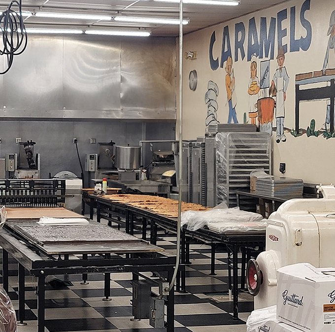 The "CARAMELS" wall mural watches over its molten kingdom like a sweet sentinel. Here, sugar transforms into that gooey gold that makes dentists both worried and wealthy.