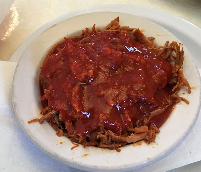 Carne adovada that's had a long, meaningful relationship with red chile. This isn't fast food; it's slow food that's worth the wait.