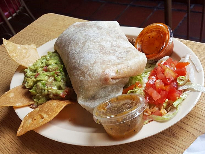 This burrito isn't just a meal; it's a commitment, a relationship, and possibly the reason stretchy pants were invented.