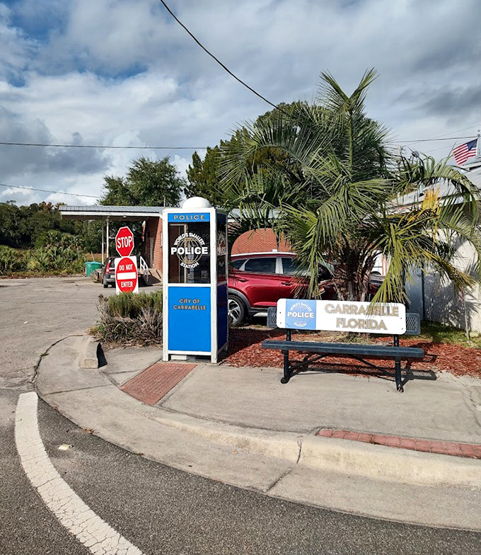 The perfect Florida photo op: palm trees, blue skies, and a police station smaller than most people's hall closets.