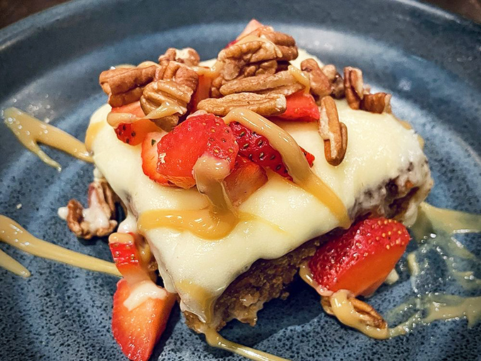 Not just dessert &ndash; it's a structural marvel of cream cheese frosting, strawberries, and pecans that would make Frank Lloyd Wright weep with joy.