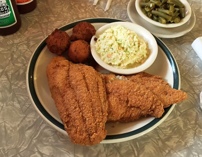 Cornmeal-crusted catfish that would make a Mississippi fisherman weep with joy. Those hushpuppies aren't just sides&mdash;they're little orbs of Southern comfort.