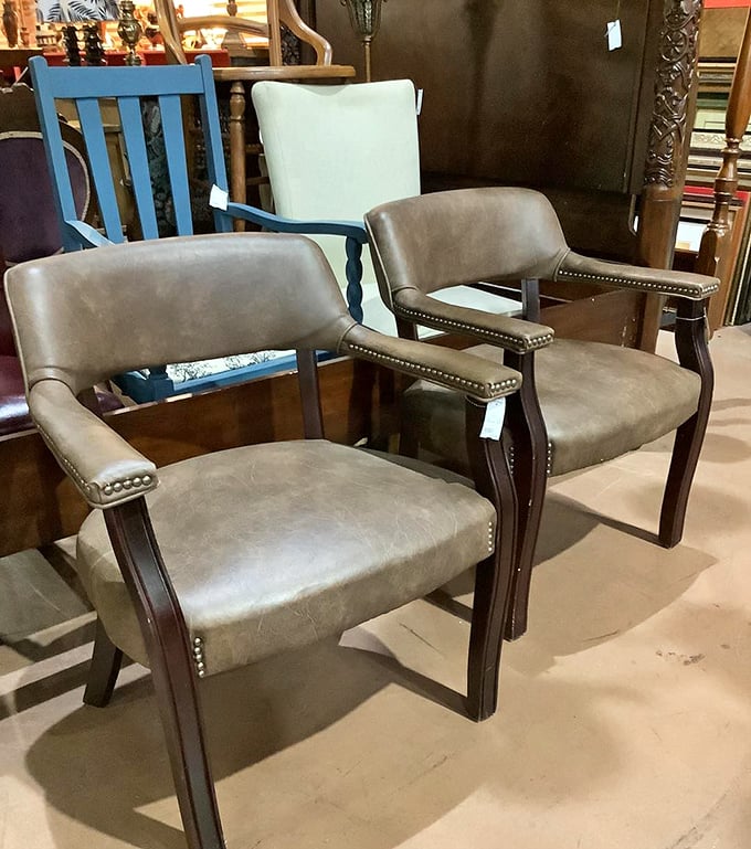 These leather armchairs aren't just furniture; they're time machines waiting to transport you to evenings of books and bourbon.