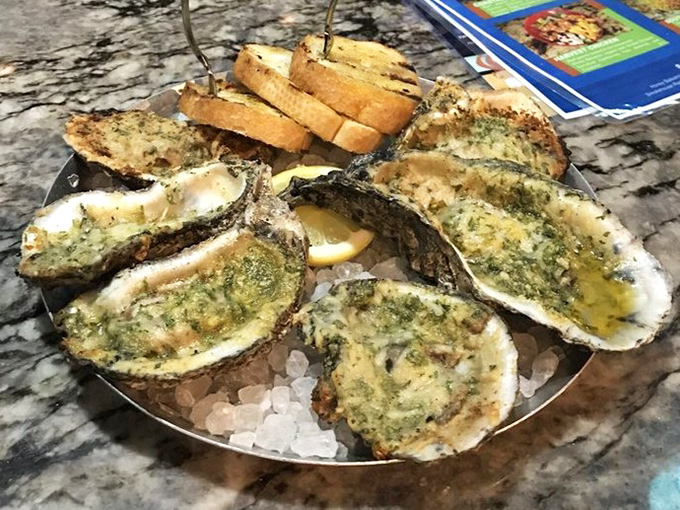 These chargrilled oysters aren't just cooked, they're transformed &ndash; wearing a buttery, herby tuxedo for their grand entrance to your palate.