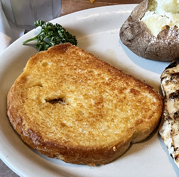 The legendary cheese toast&mdash;golden, buttery, and unapologetically simple. It's the sidekick that sometimes steals the show from the steaks themselves.