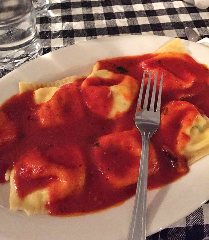 Cheese ravioli swimming in that signature red sauce&mdash;like little pillows of joy having the best bath of their lives.