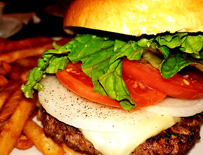 Behold the architecture of a proper diner burger &ndash; the melty cheese, the garden-fresh toppings, the golden fries standing at attention.