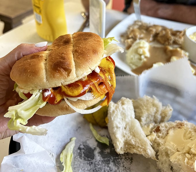 Burger bliss in its purest form. That golden cheese cascade and fresh toppings on a toasted bun might just solve all of life's problems.