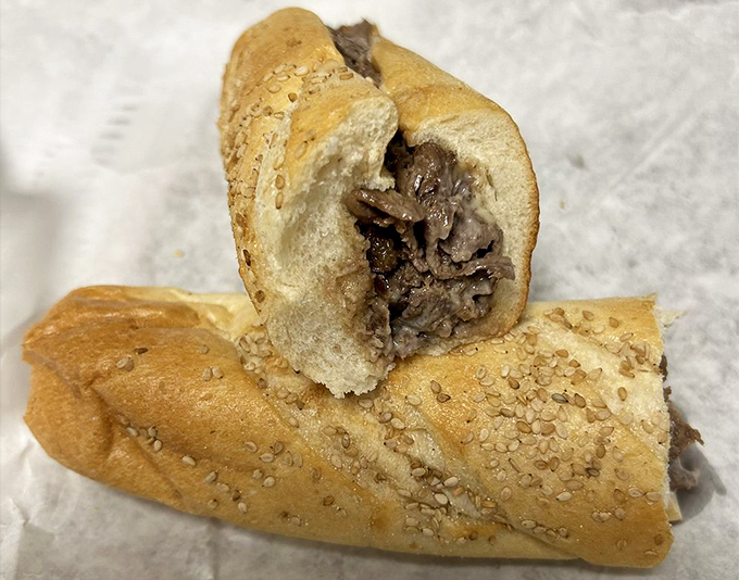 A proper cheesesteak should require a strategic approach to eating. This one demands both napkins and a moment of silent appreciation.